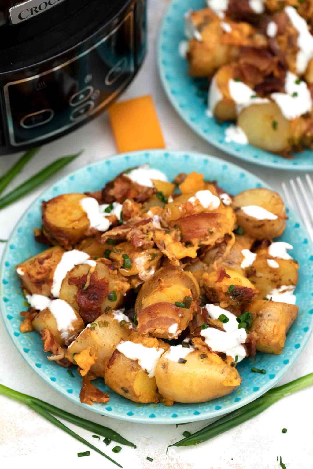Loaded Slow Cooker Potatoes [Video] - Sweet and Savory Meals