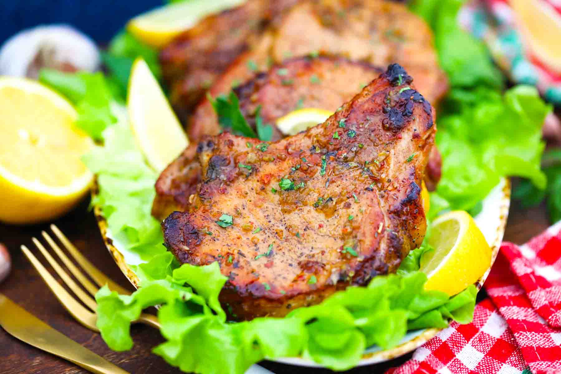 Baked Lemon Garlic Pork Chops - Sweet and Savory Meals