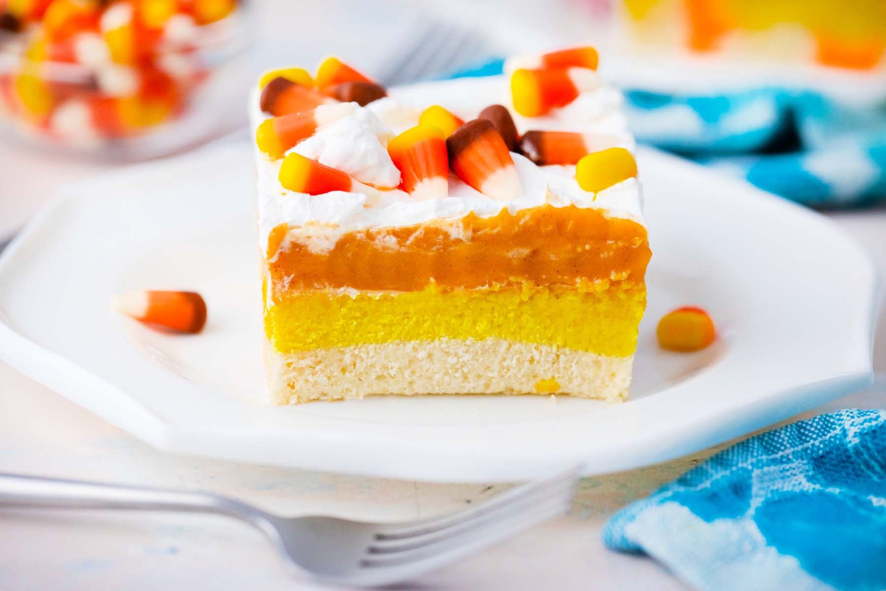 Candy Corn Poke Cake - Sweet and Savory Meals