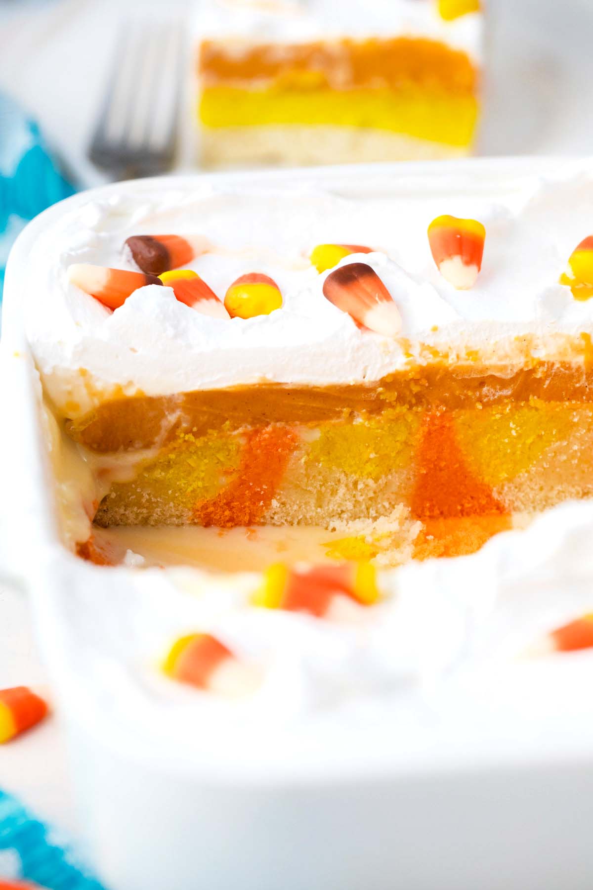 Candy Corn Poke Cake - Sweet and Savory Meals